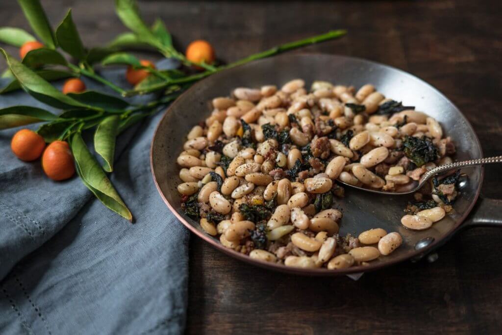 Marcella Beans with Sausage and Beet Greens - The Taste Edit