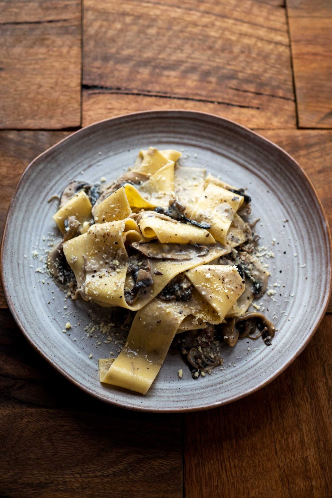 Egg yolk pappardelle with mushroom and taleggio sauce - The Taste Edit